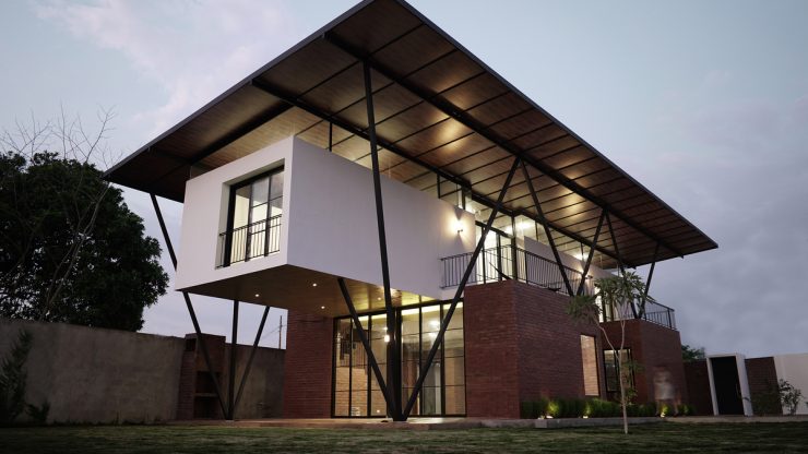 Diseño casa moderna terreno triangular